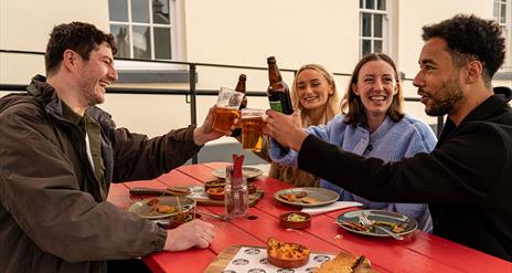 Group enjoying refreshments at the Beer Masterclass at the Walled City Brewery in Derry~Londondonderry