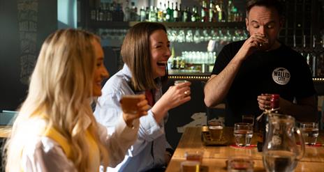 Group enjoying the Beer Masterclass at the Walled City Brewery in Derry~Londondonderry