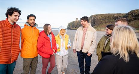 Group on the beach enjoying the Mussenden Unwind experience