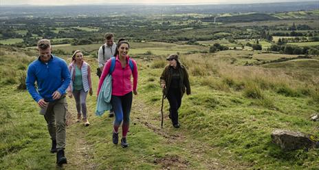 Group setting off on a walk in the countryside with Cathy ONeill of The Emigrants Walk experience