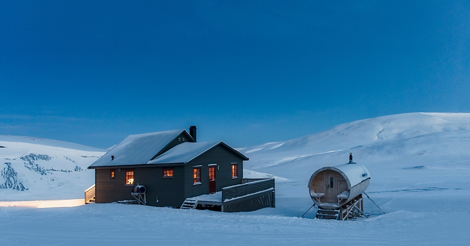 From Glaciers to Saunas: Juva Cabin Snowmobile Expedition - Hurtigruten ...