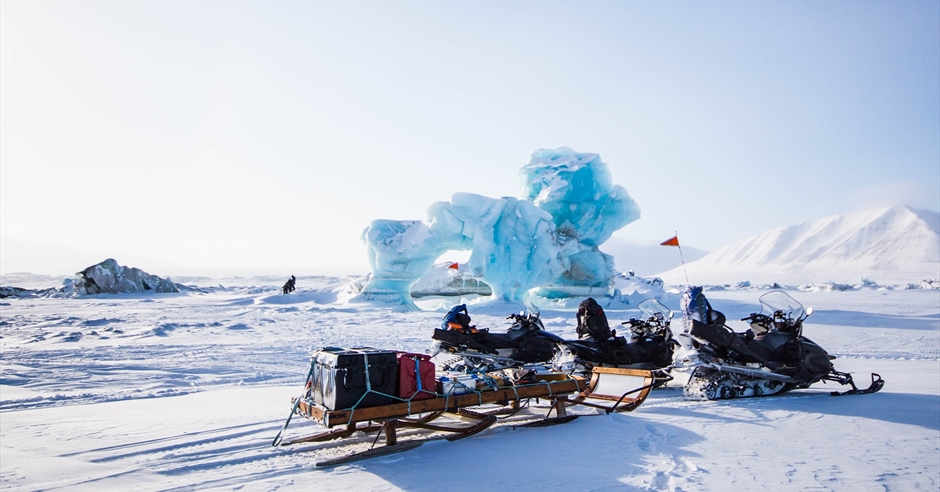 East Coast Snowmobile Safari - Hurtigruten Svalbard - Snowmobile in ...