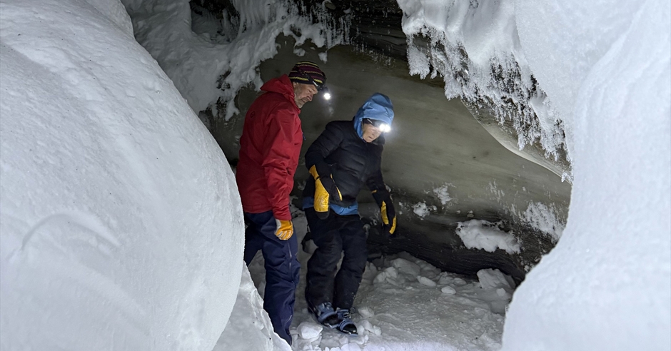 Hike to a magical ice cave in Svalbard - Backyard Svalbard - Caving in ...