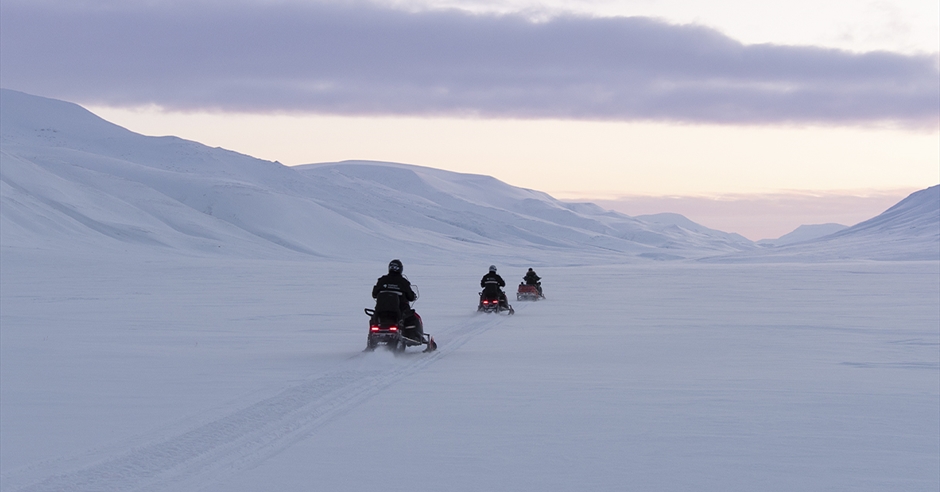 Snowmobile safari to the wild fjords - Svalbard Adventures - Snowmobile ...