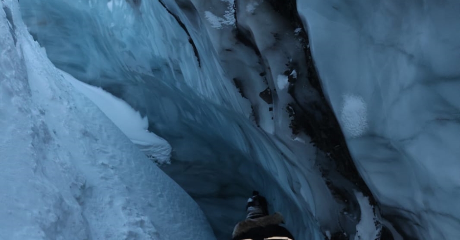 Hike to a magical ice cave in Svalbard - Backyard Svalbard - Caving in ...