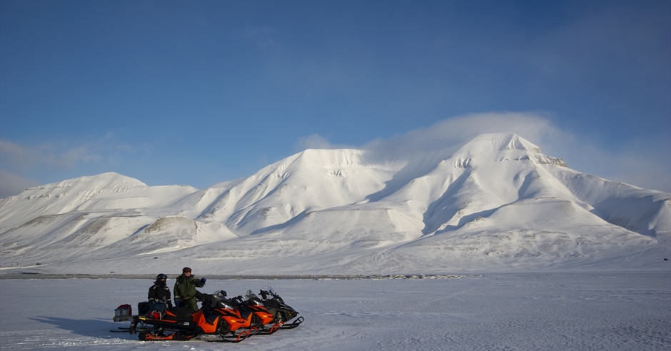 Snowmobile Safari to Ice Cave - Svalbard Adventures - Caving in ...