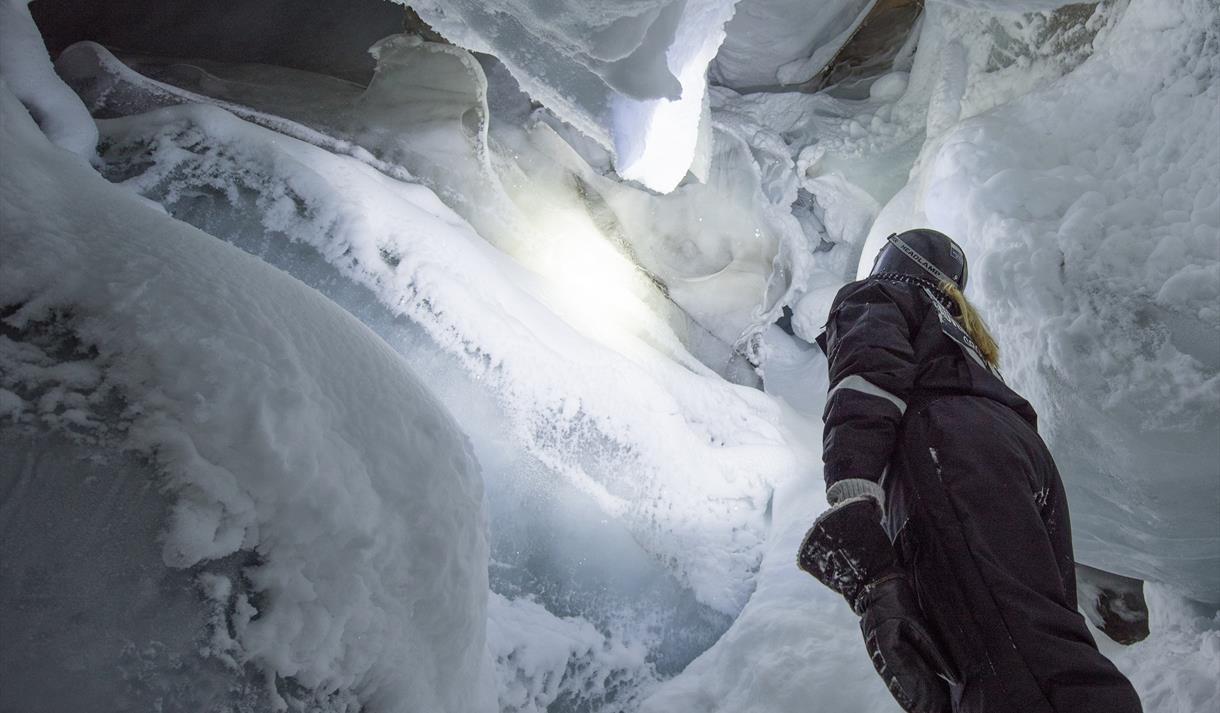 Snowmobile Safari to Ice Cave - Svalbard Adventures - Caving in ...