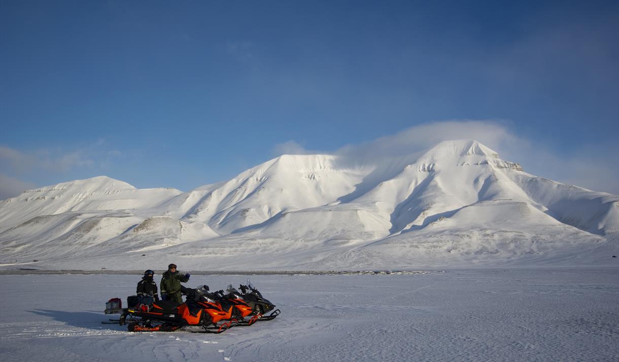 Snowmobile Safari to Ice Cave - Svalbard Adventures - Caving in ...