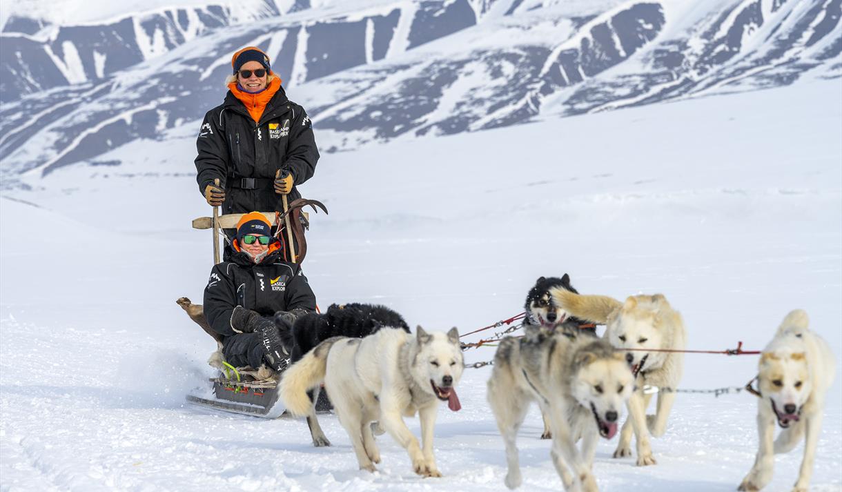 Arctic dog sledding in Bolterdalen - Basecamp Explorer Spitsbergen ...