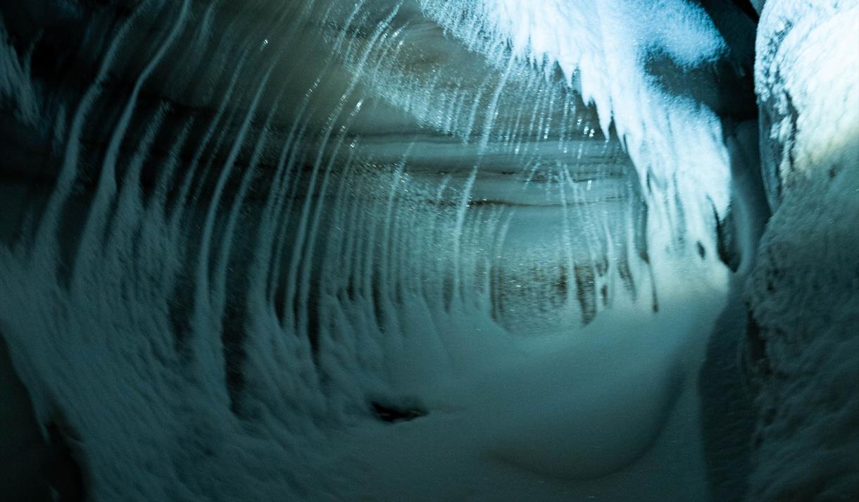 Ice cave: Hike to explore the ice cave - Svalbard Wildlife Expeditions ...