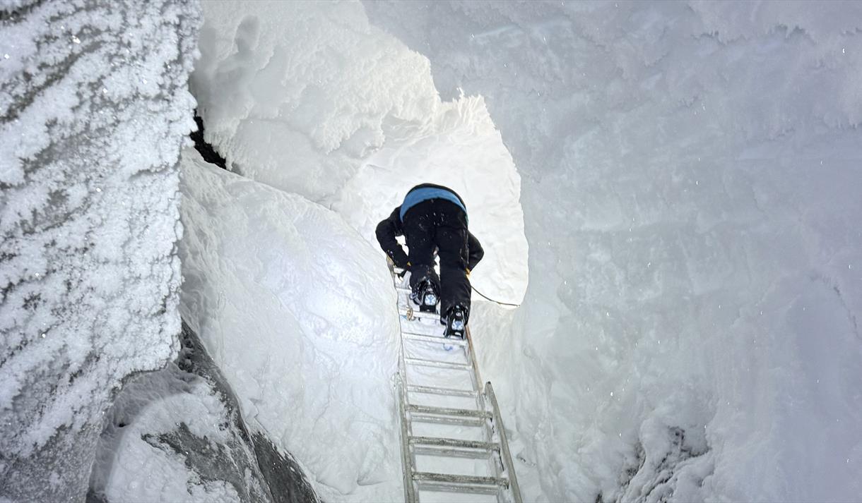 Hike to a magical ice cave in Svalbard - Backyard Svalbard - Caving in ...